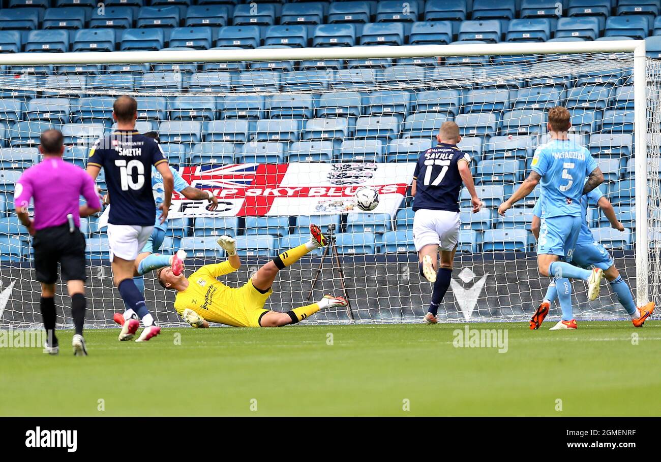 Millwall's George Saville scores their side's first goal of the game ...