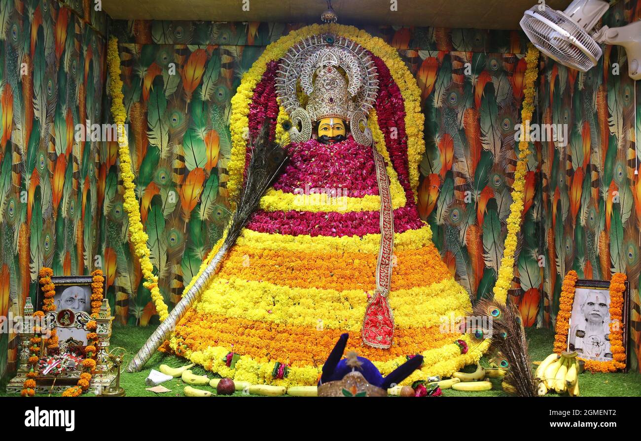 Idol of Hindu God Khatu Shyam Baba, form of Lord Krishna decorated with ...