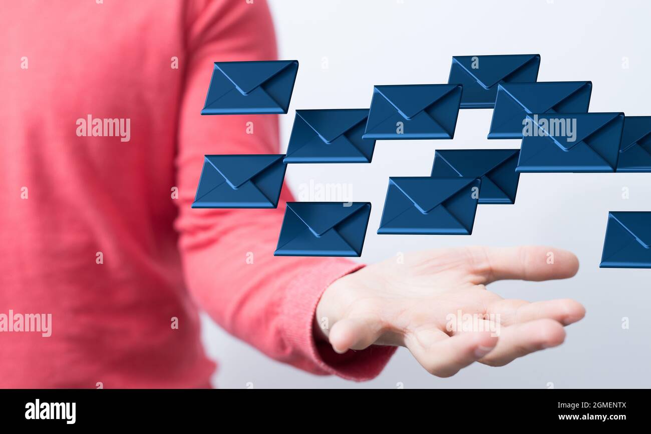Female hand presenting email icons in the air Stock Photo - Alamy