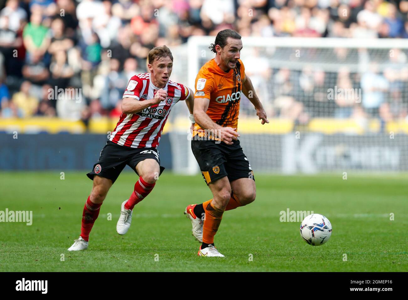 Ben Osborn #23 of Sheffield United and Lewis Coyle #2 of Hull City ...