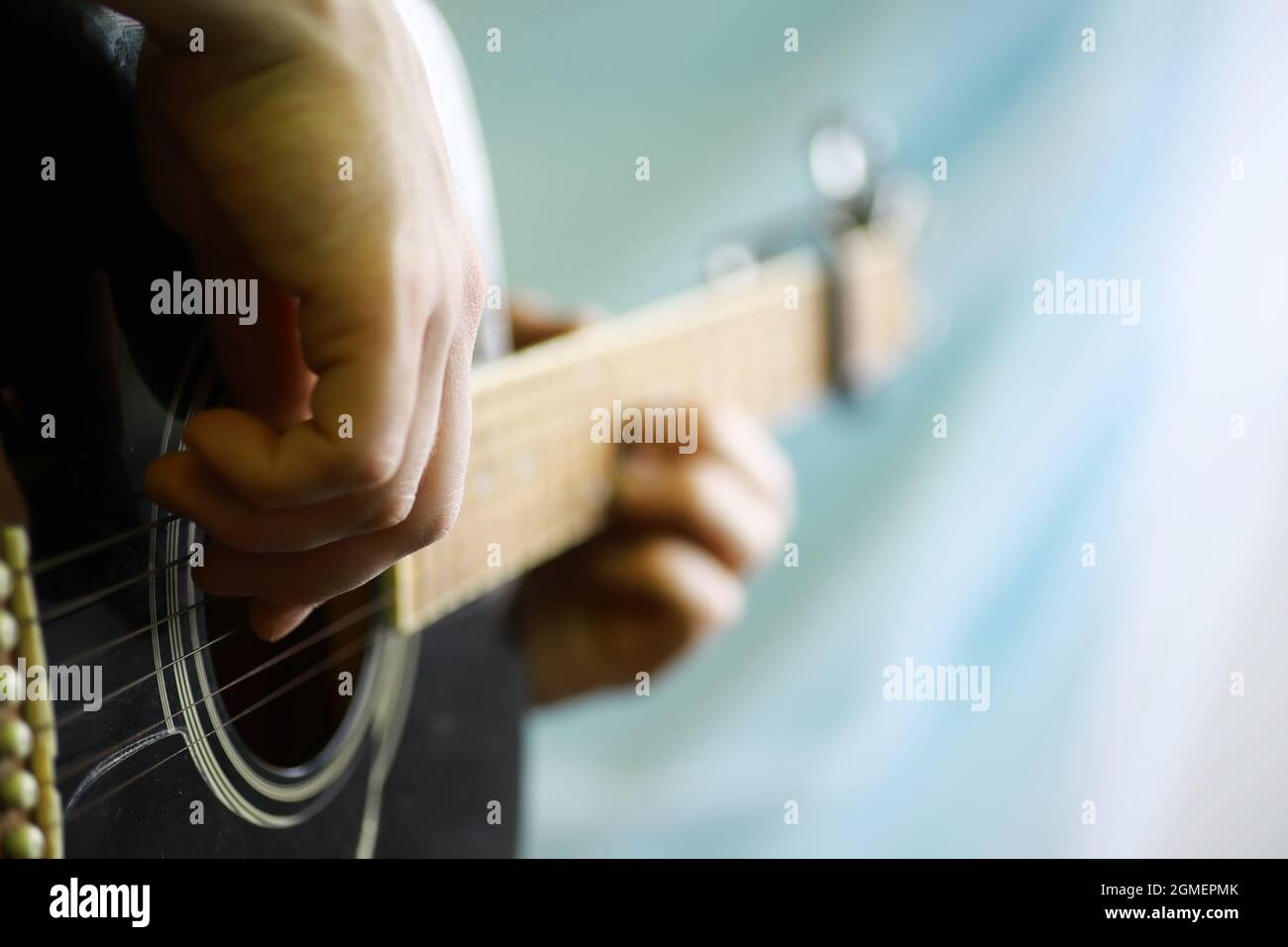 An acoustic guitar for artist playing a stringed musical instrument on ...
