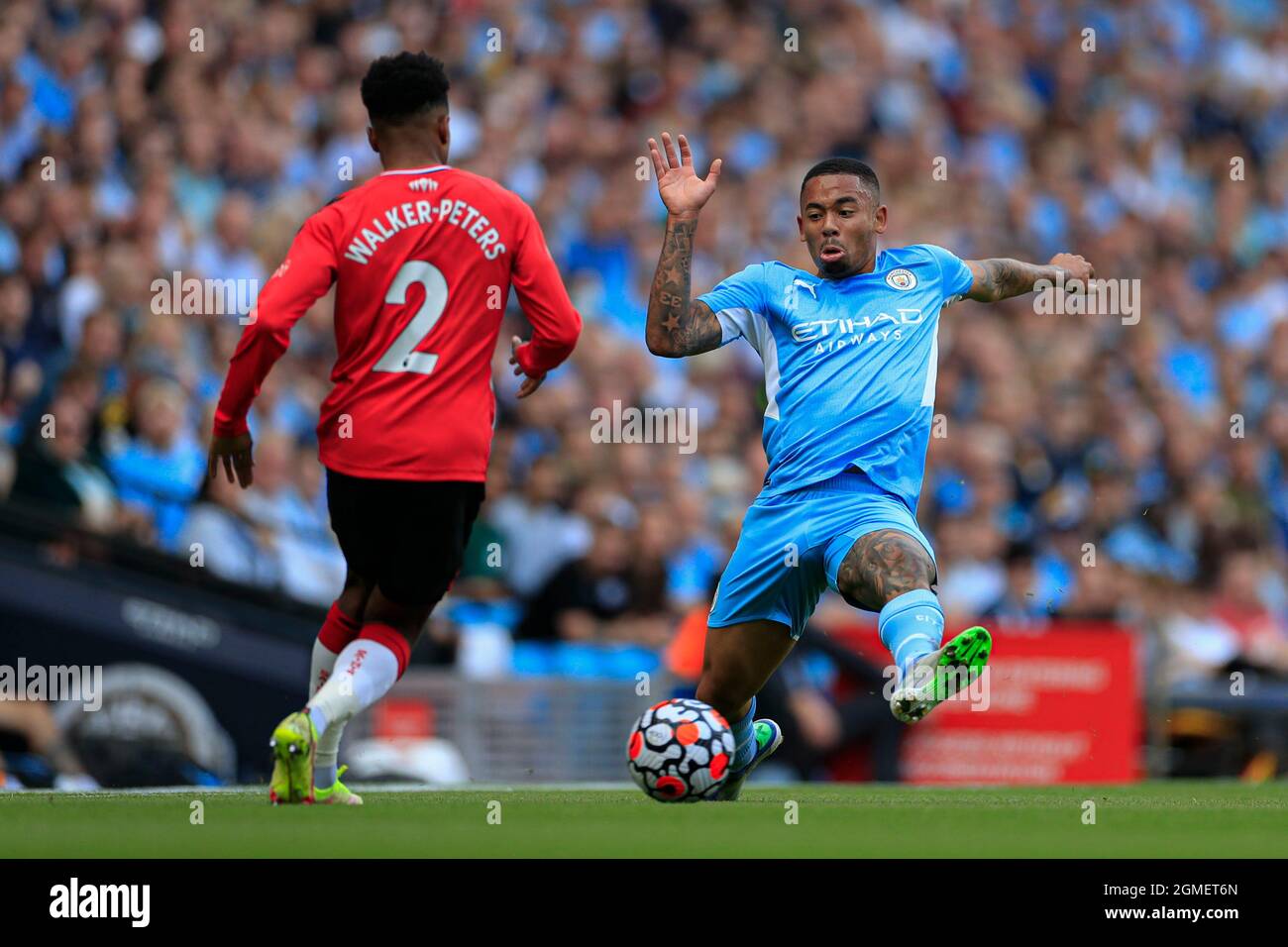 Gabriel Jesus #9 of Manchester City and Kyle Walker-Peters #2 of ...