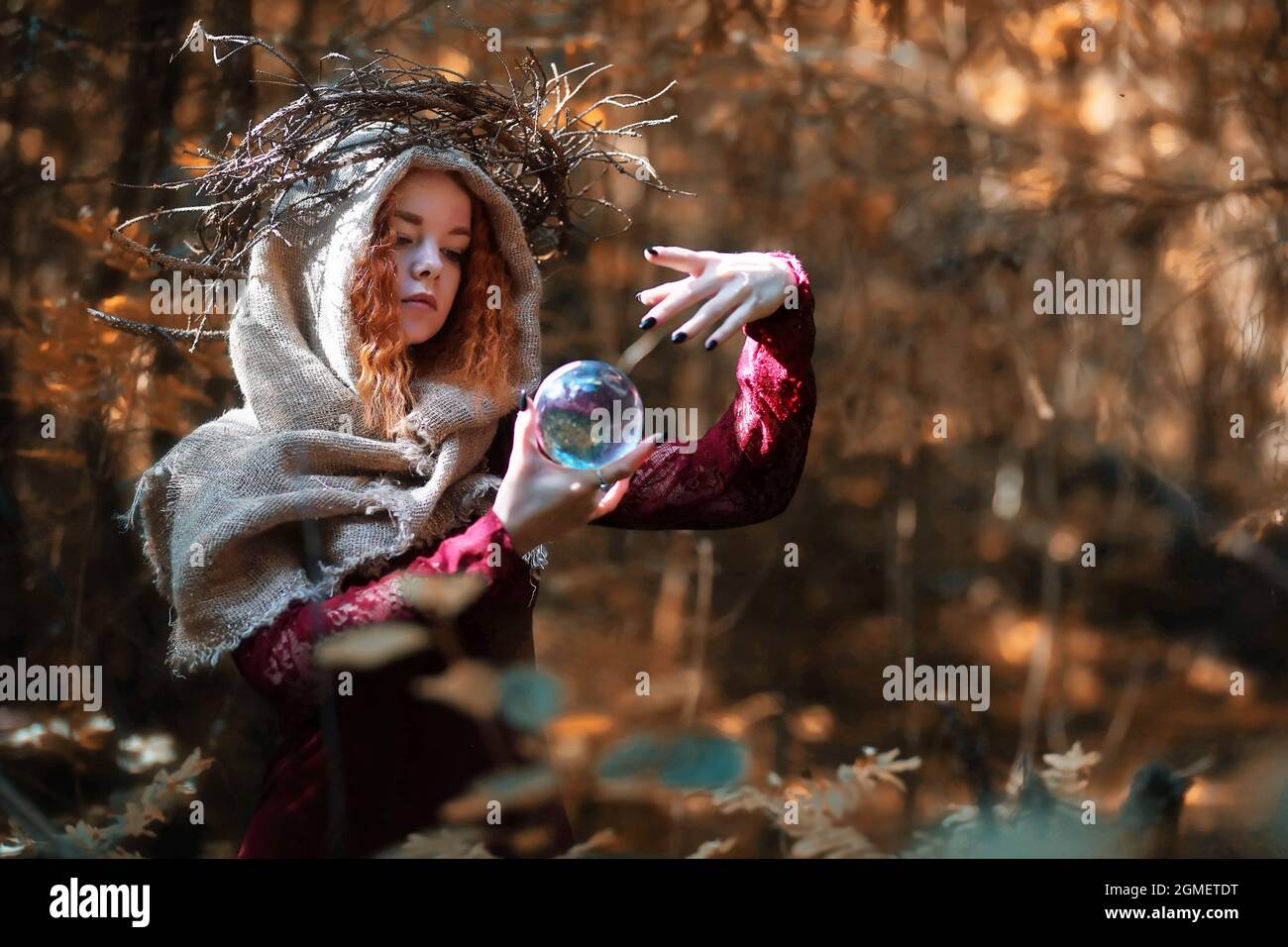Fortune-teller conducts a ritual in the depths of the forest Stock ...