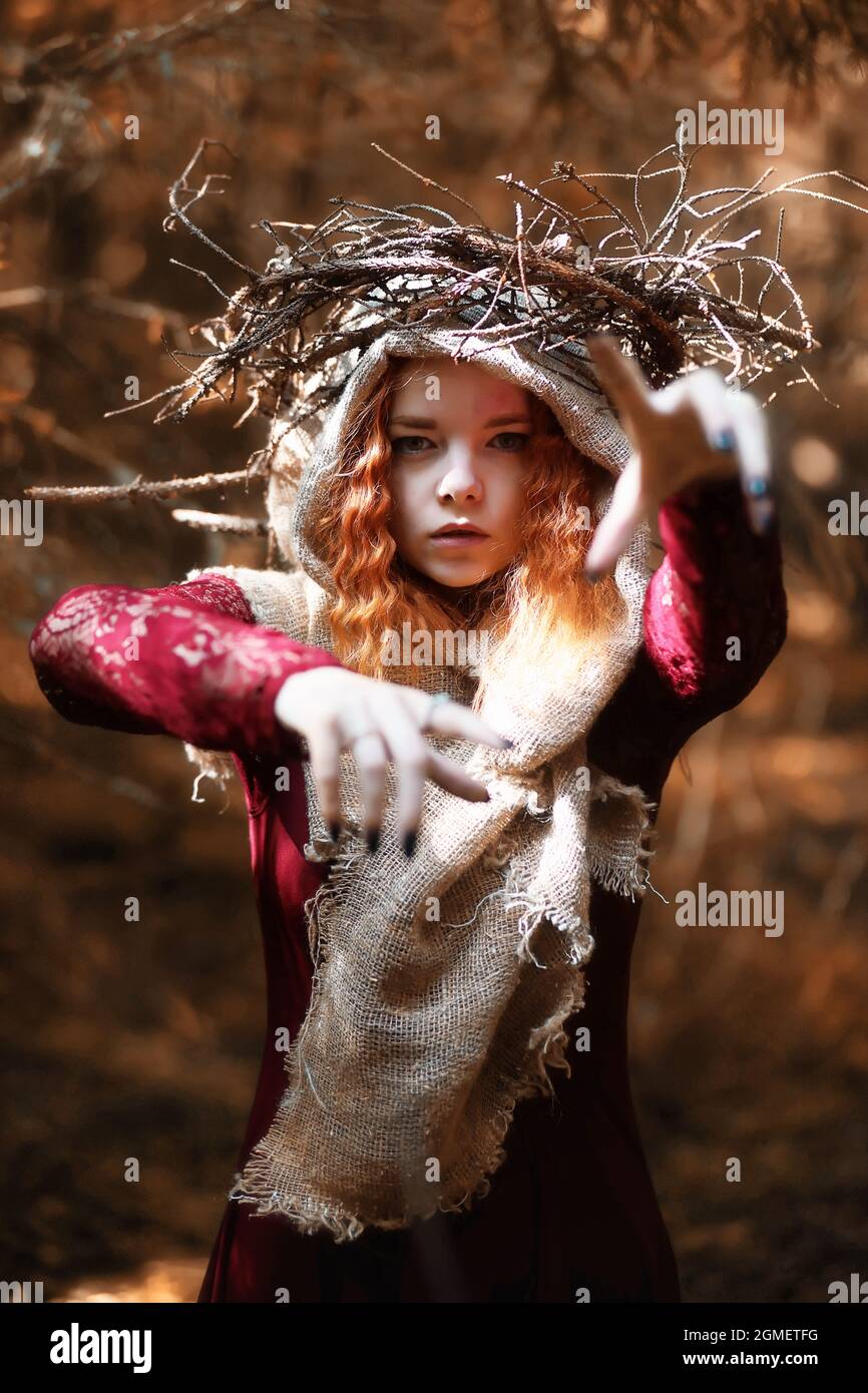 Fortune-teller conducts a ritual in the depths of the forest Stock ...