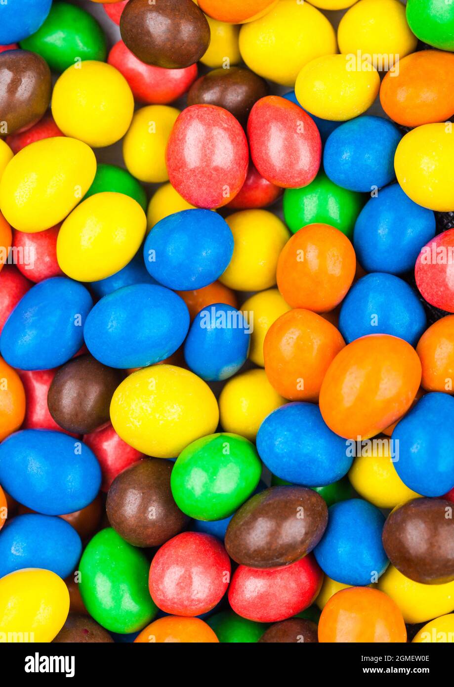 Milk chocolate sweet candies with a rice centre in a sugar shell to use ...