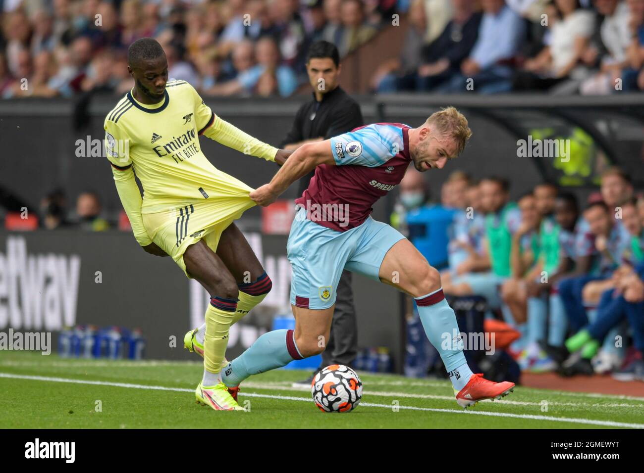 Burnley, UK. 18th Sep, 2021. Nicolas Pepe #19 of Arsenal and Charlie ...