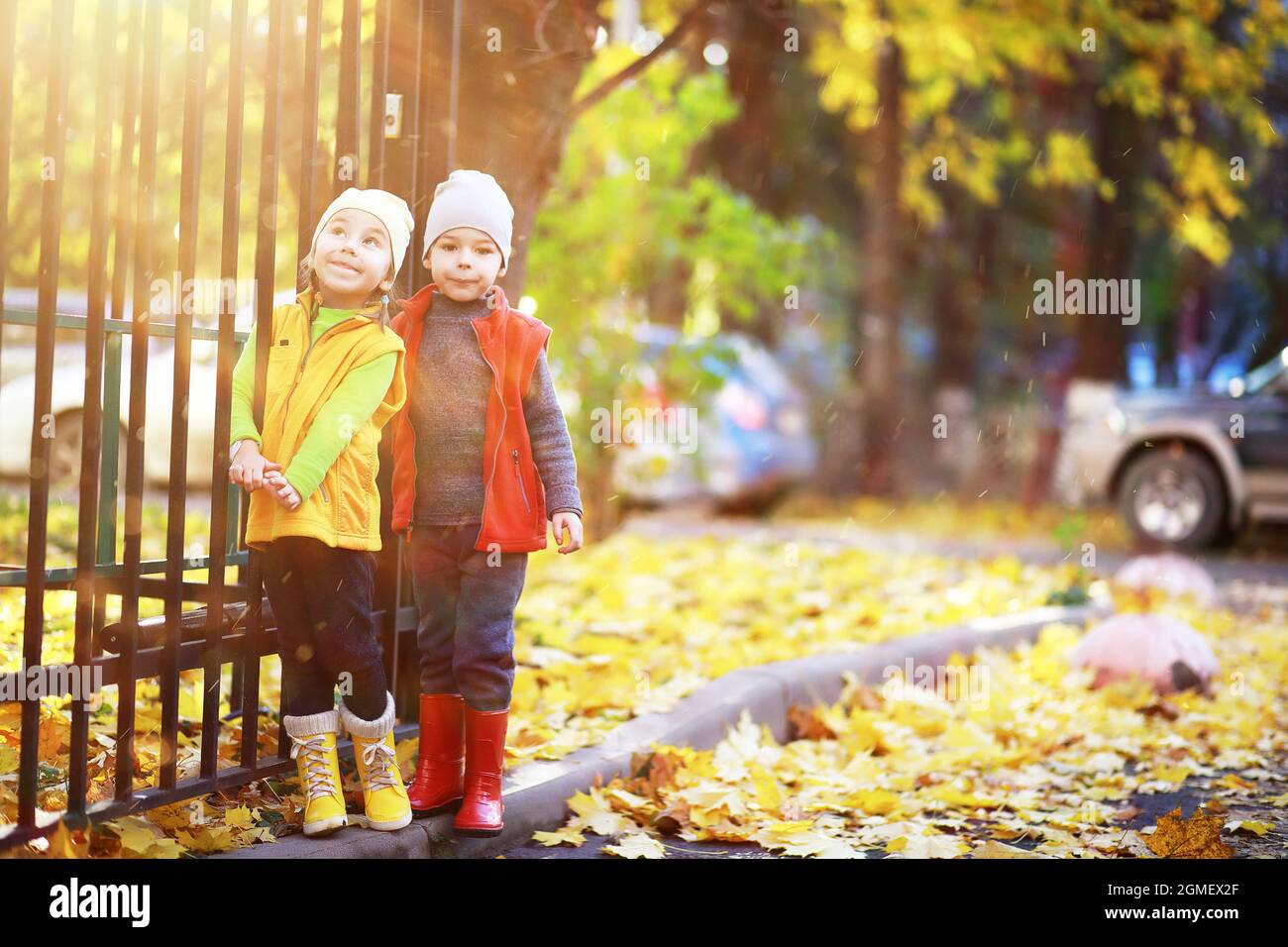 Children walk in the autumn park in the fall Stock Photo - Alamy