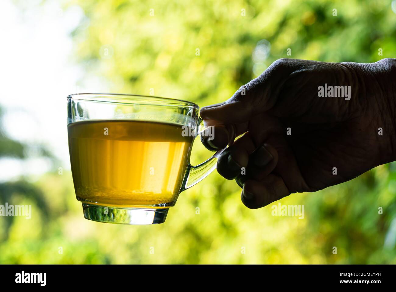 Senior man lifted cup hot hi-res stock photography and images - Alamy