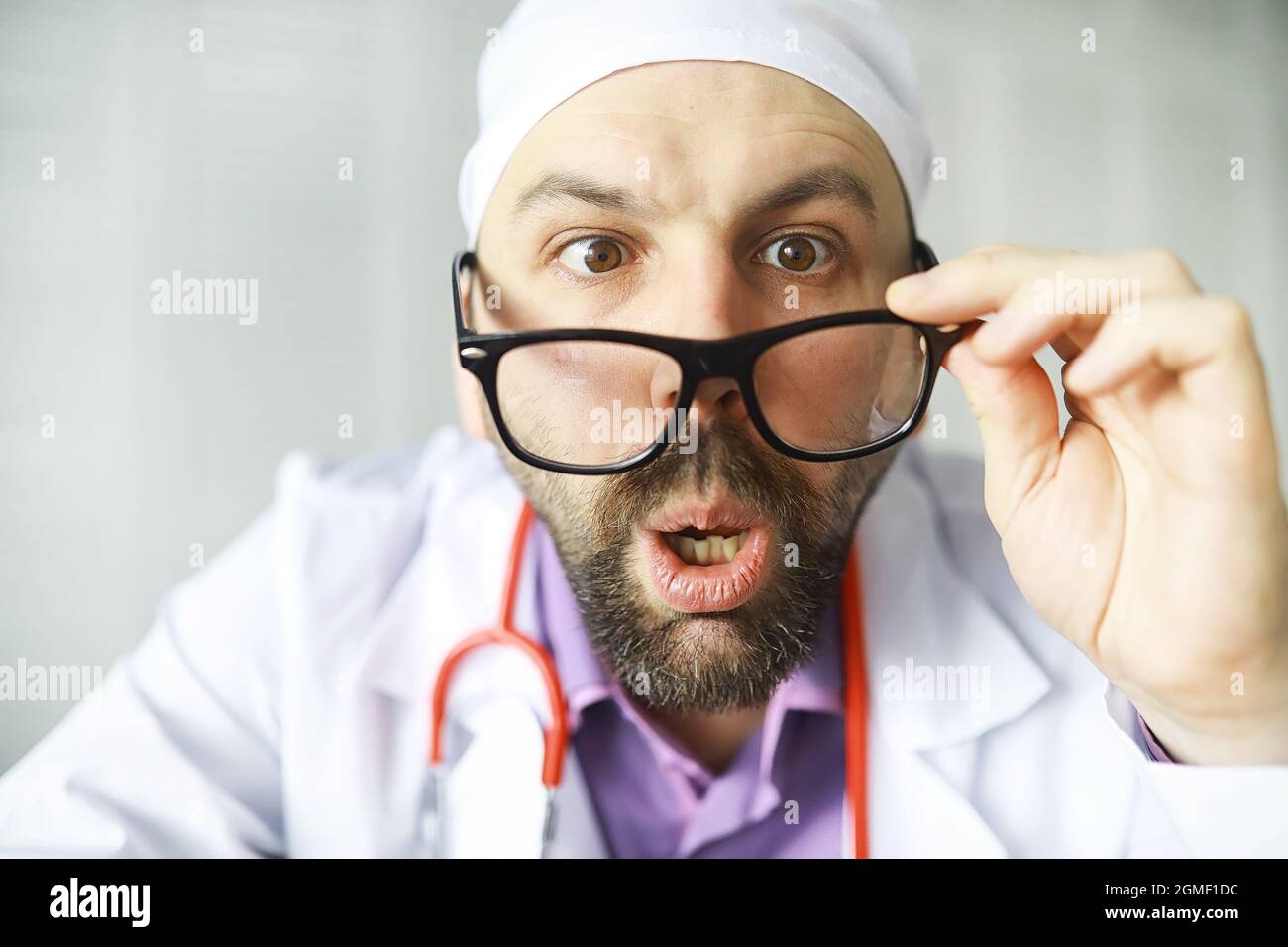 Medical uniform hanging up hi-res stock photography and images - Alamy