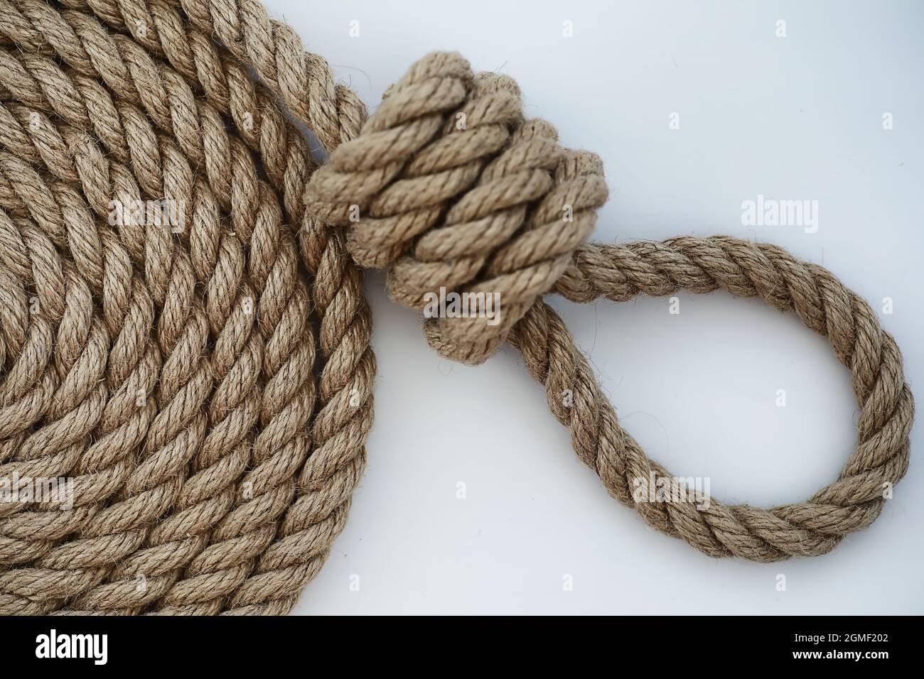 Braided thick rope tied in a skein. Hemp rope for decoration and design ...