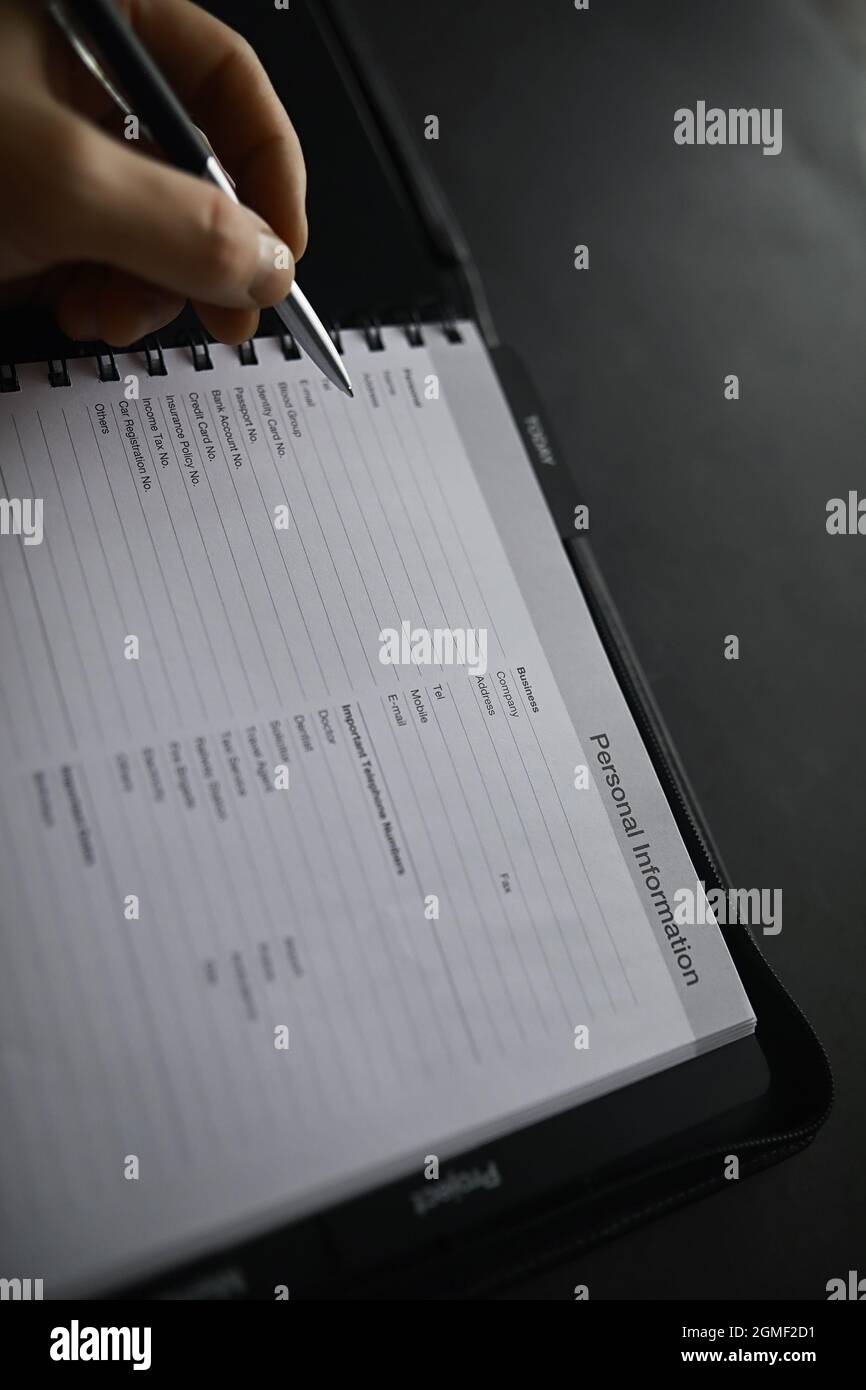 Filling out a registration form hi-res stock photography and images - Alamy