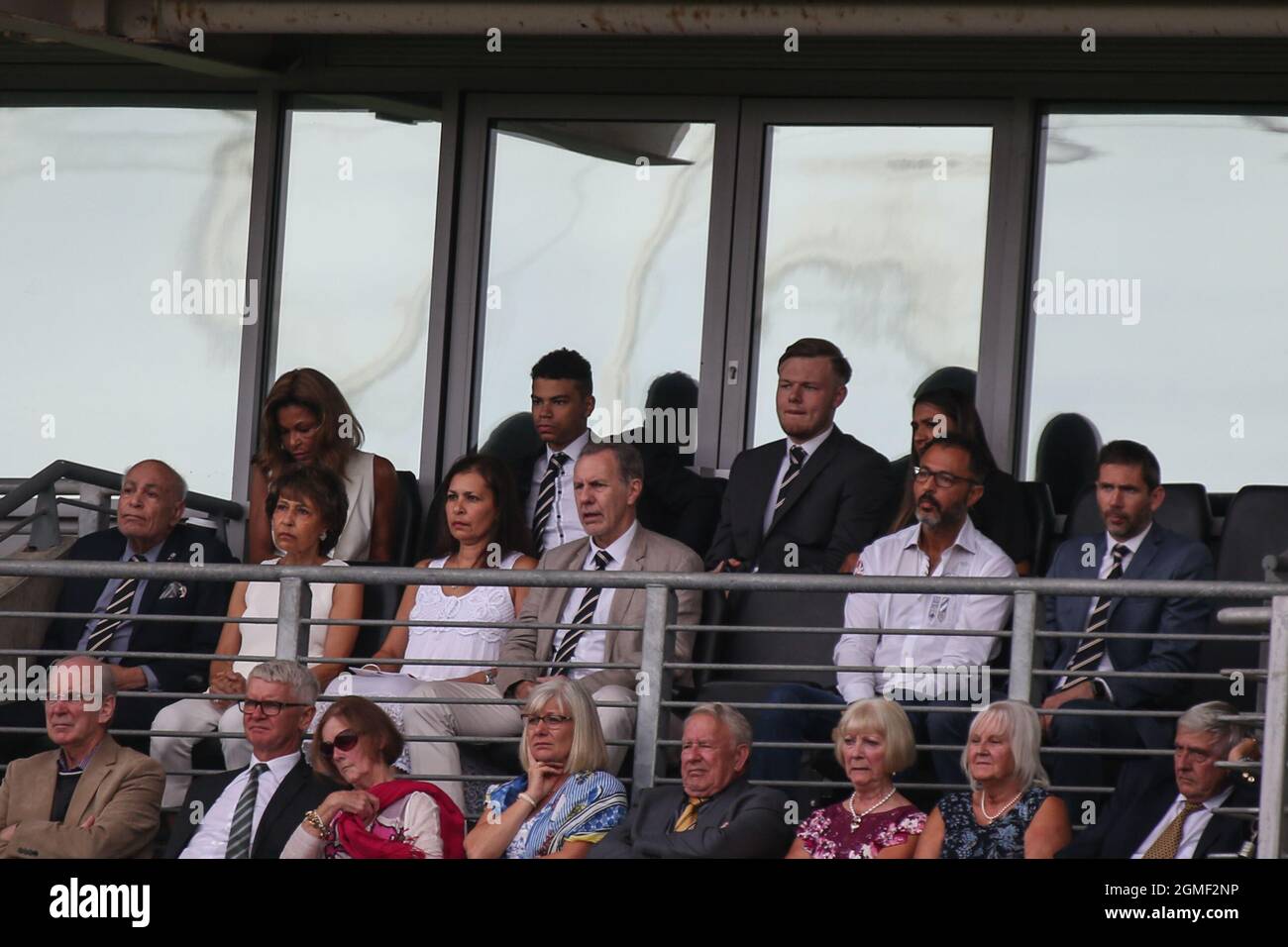 The Allam family watch from the stands Stock Photo - Alamy