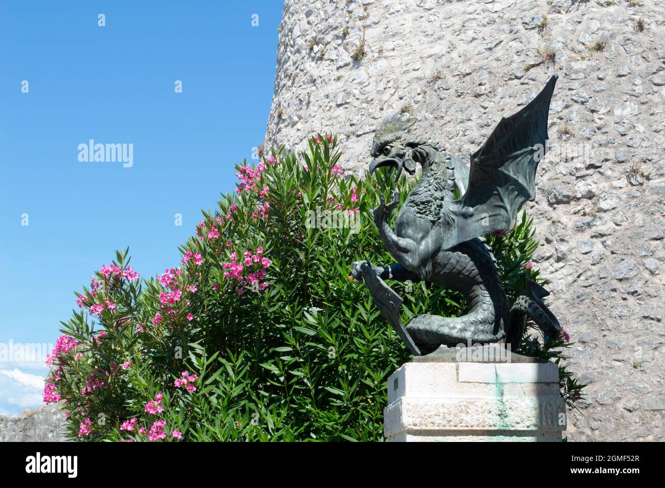 Bronze statue of a dragon, symbol of Trsat, historic landmark in the ...