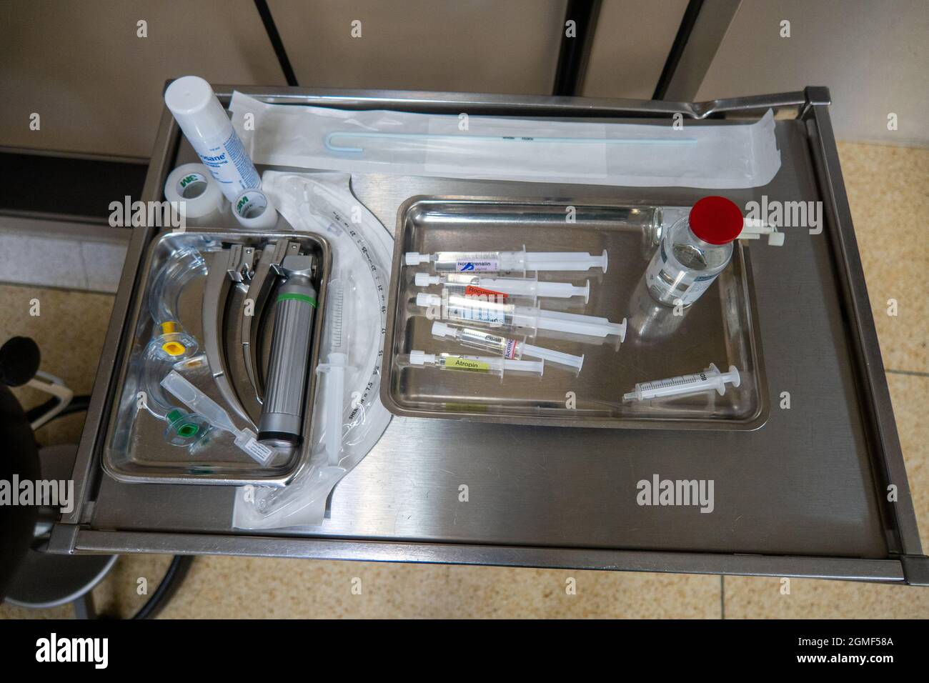 Various medications and a tube for performing intubation anesthesia are ...