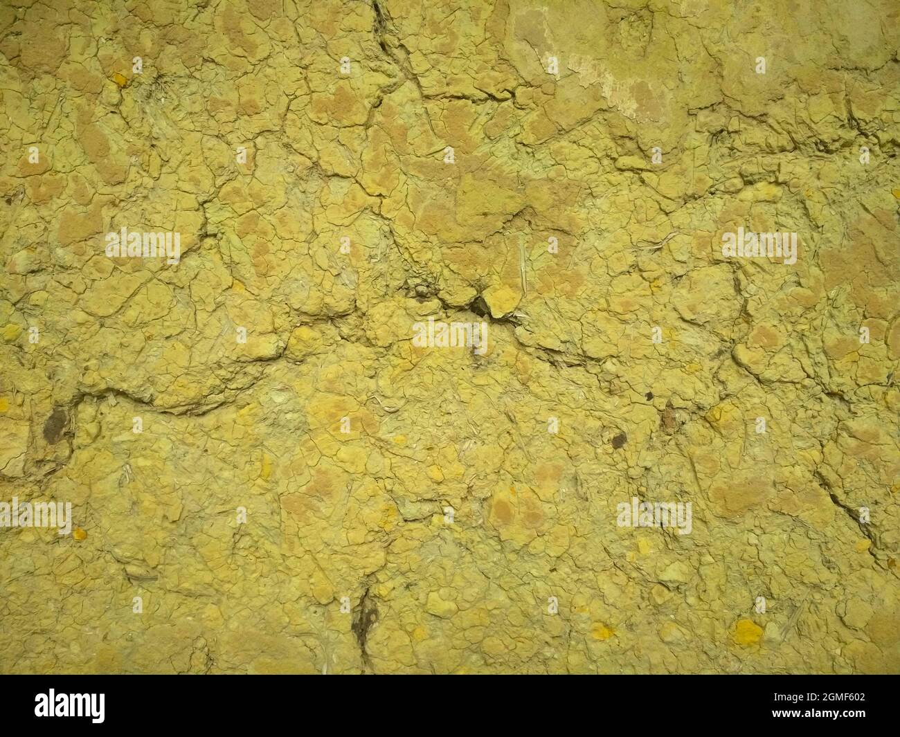 Texture of yellow cracked clay rock. Clay walls with cracks. For 3D ...