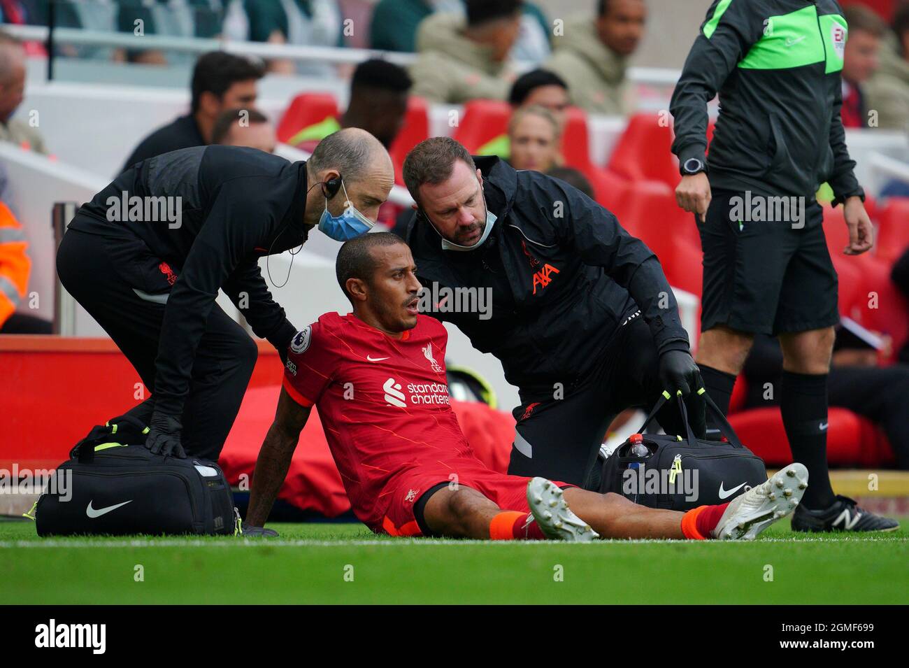 Liverpool's Thiago Alcantara receives treatment after picking up in ...