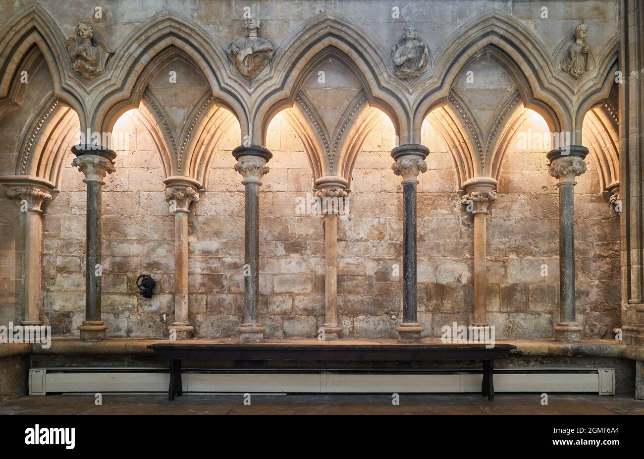 Decorative gothic stone arch on a wall at the medieval cathedral in ...