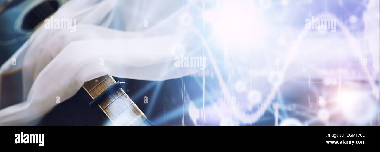 An acoustic guitar for artist playing a stringed musical instrument on ...