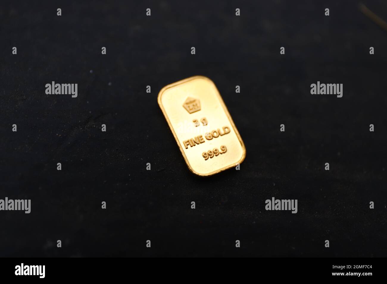 Sidoarjo, Indonesia - 21 July, 2021: Fine gold bar (goldbar) on black ...