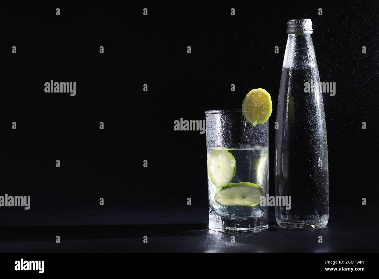 Lime water. Drinking water with fresh lime. Mineral water. Healthy ...