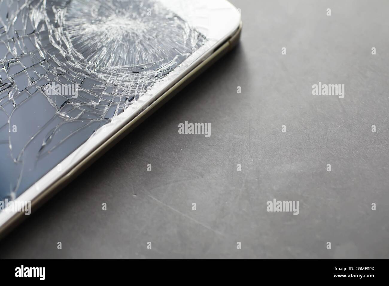 Crack on the glass. Broken screen. Broken phone. Cracked glass ...