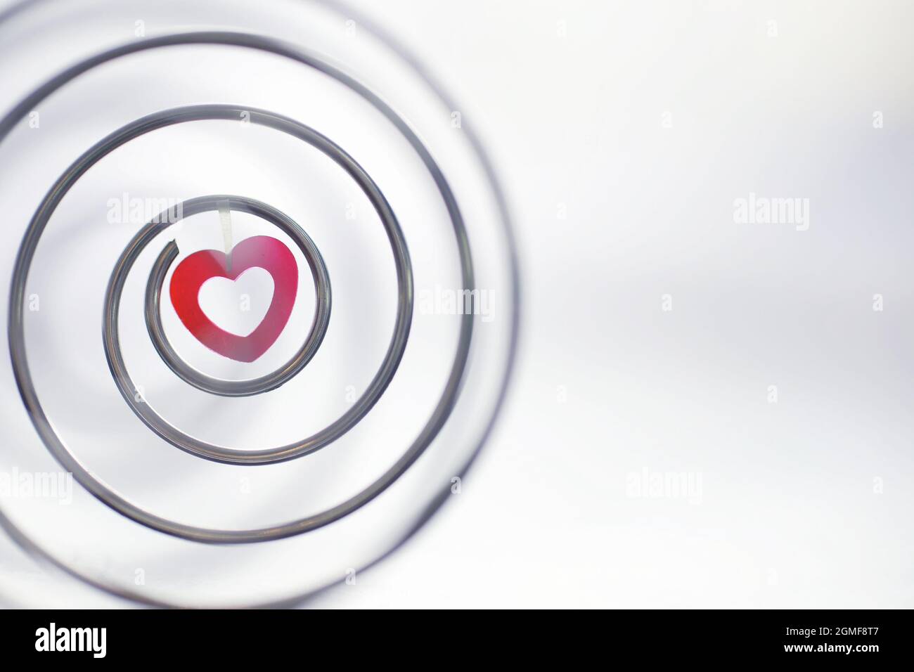 Metal spiral. The concept endless turns. Golden ratio. The concept of ...