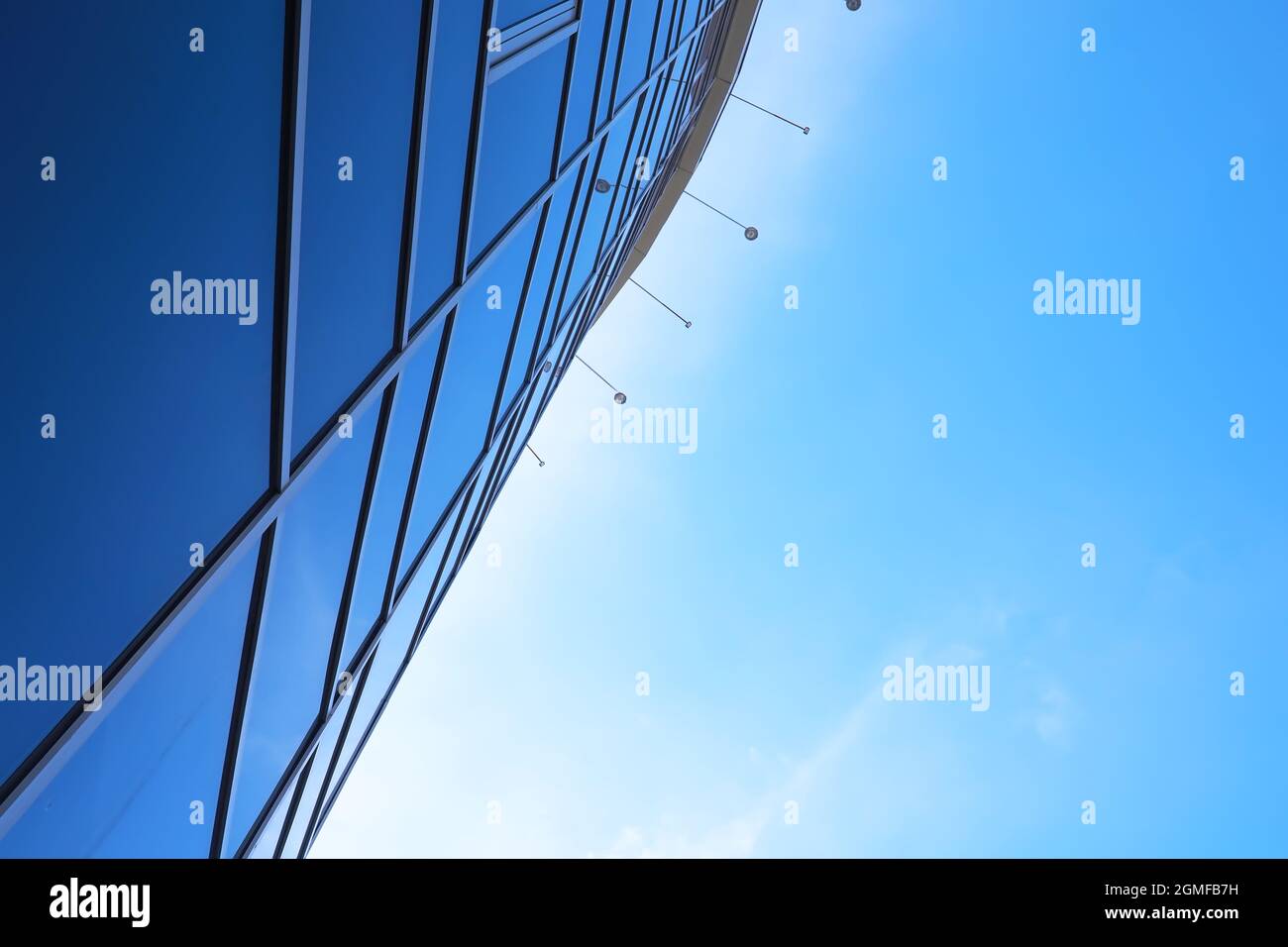 Architectural detail of the facade with multiple reflections of other ...