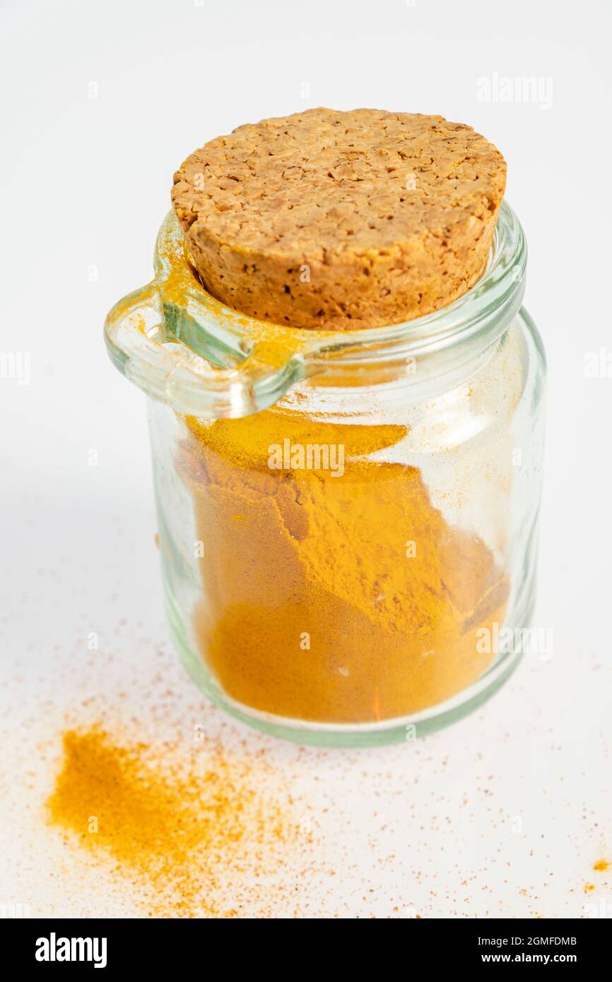 ground turmeric in a glass jar Stock Photo - Alamy