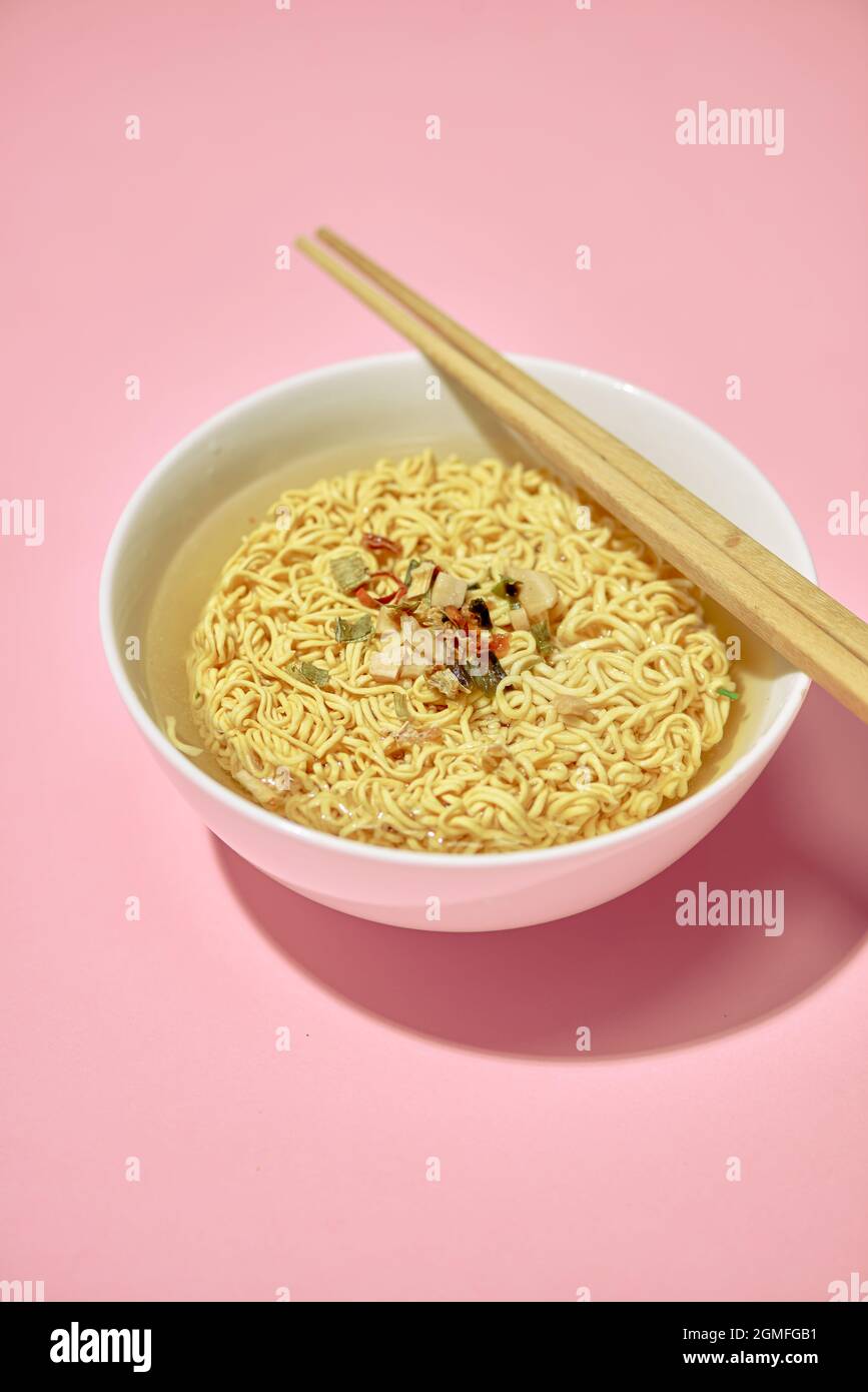 Instant noodles, instant noodles, wooden chopsticks Stock Photo - Alamy