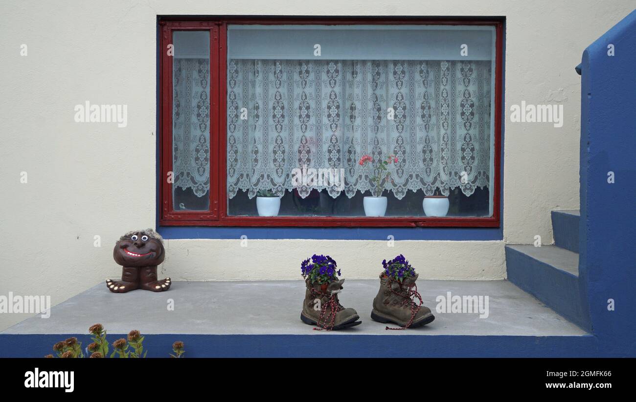 traditional window, with flowers in shoes, Isafjordur, Iceland Stock ...
