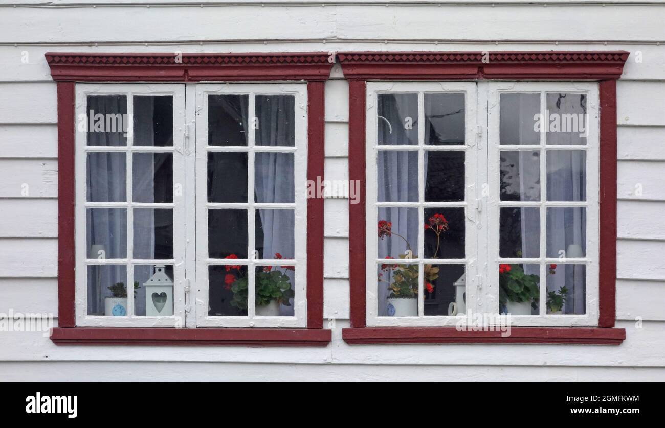 glass window with red frame, Hellesylt, Norway Stock Photo - Alamy