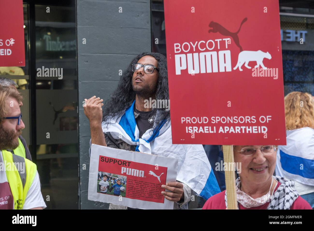London, UK. 18 Sept 2021. Campaigners outside the London Puma store in ...