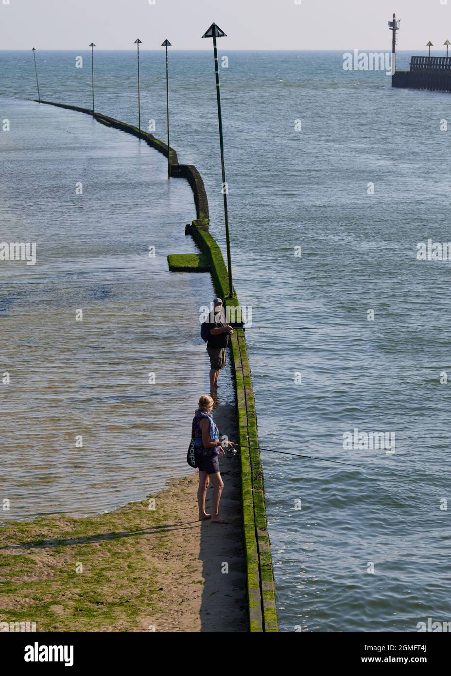 Couple seen beach fishing in Littlehampton, in summer 2021 Stock Photo ...