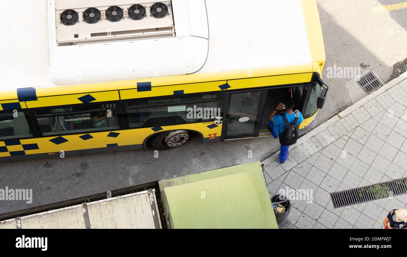 man entering an urban bus Stock Photo - Alamy