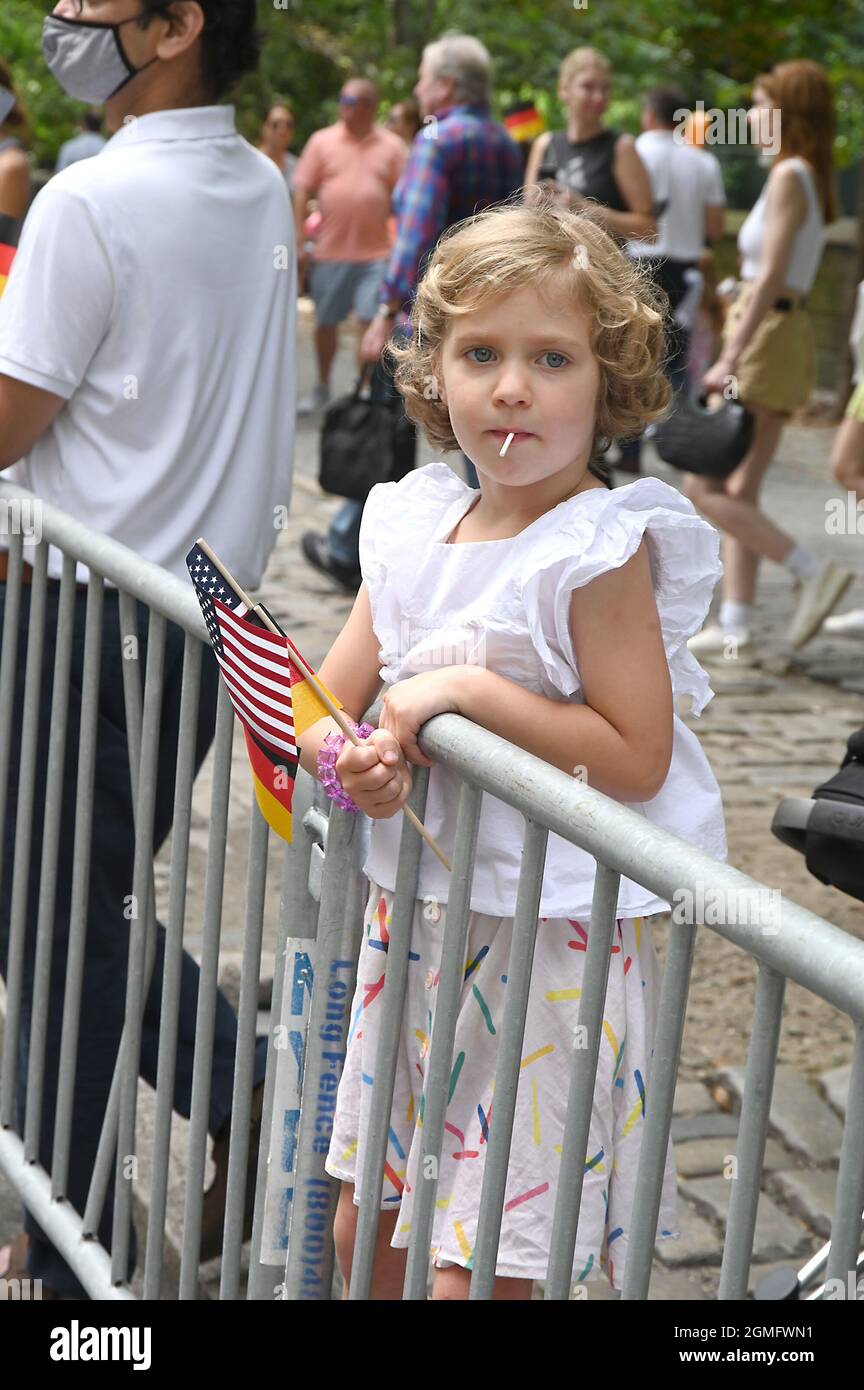 a bystander attends the 64th Annual German-American Steuben Parade on ...