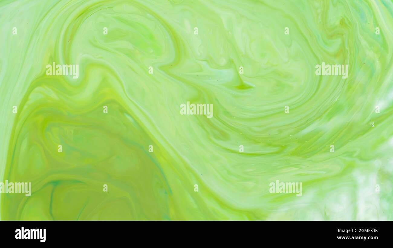 Green fluid art background. Liquid abstract pattern with UFO green ...