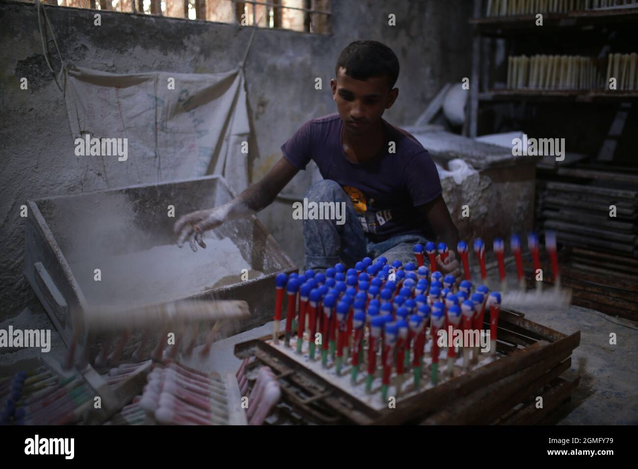 A man works in a balloon factory in Dhaka, Bangladesh. Balloon ...