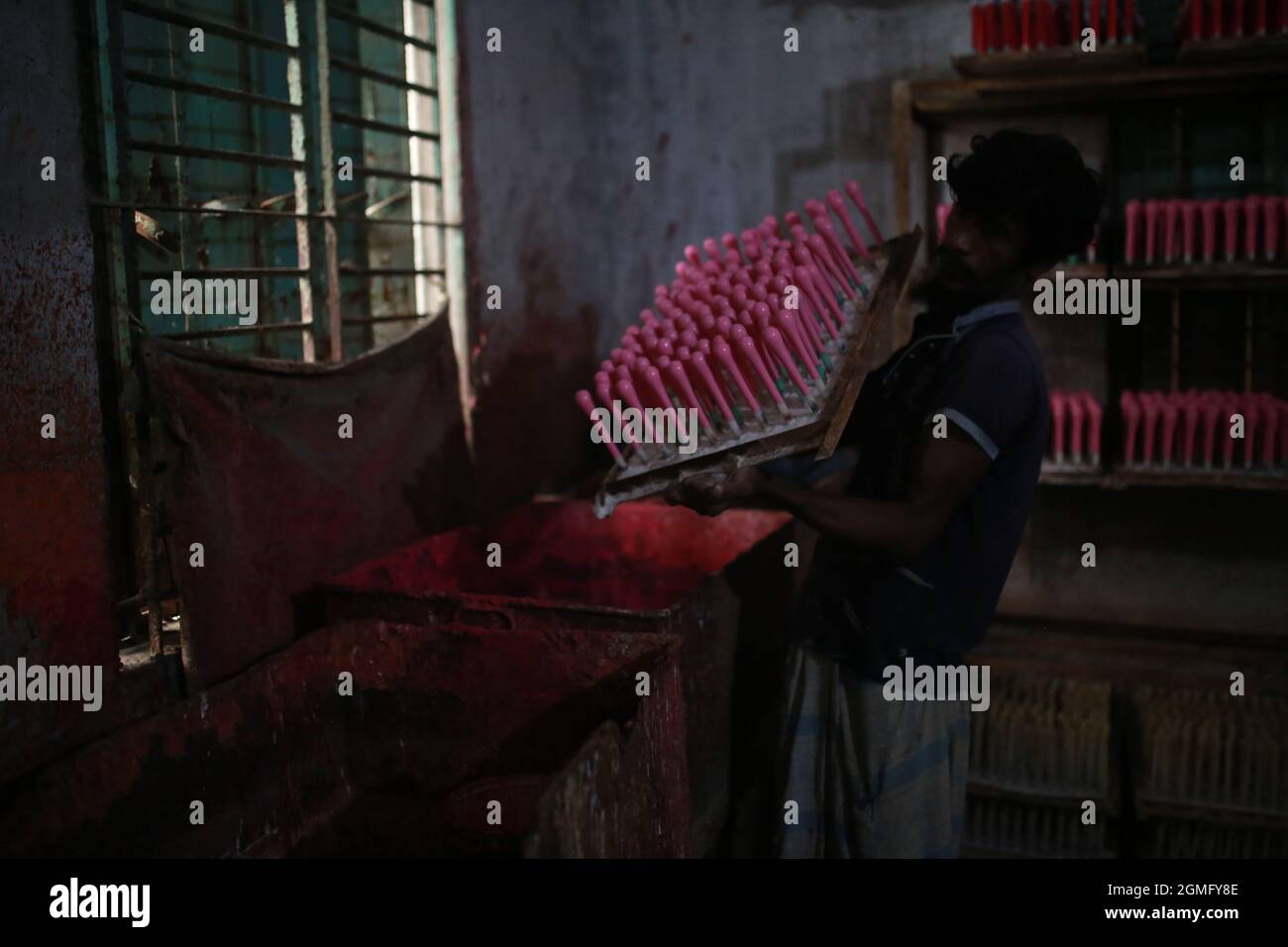 A man works in a balloon factory in Dhaka, Bangladesh. Balloon ...
