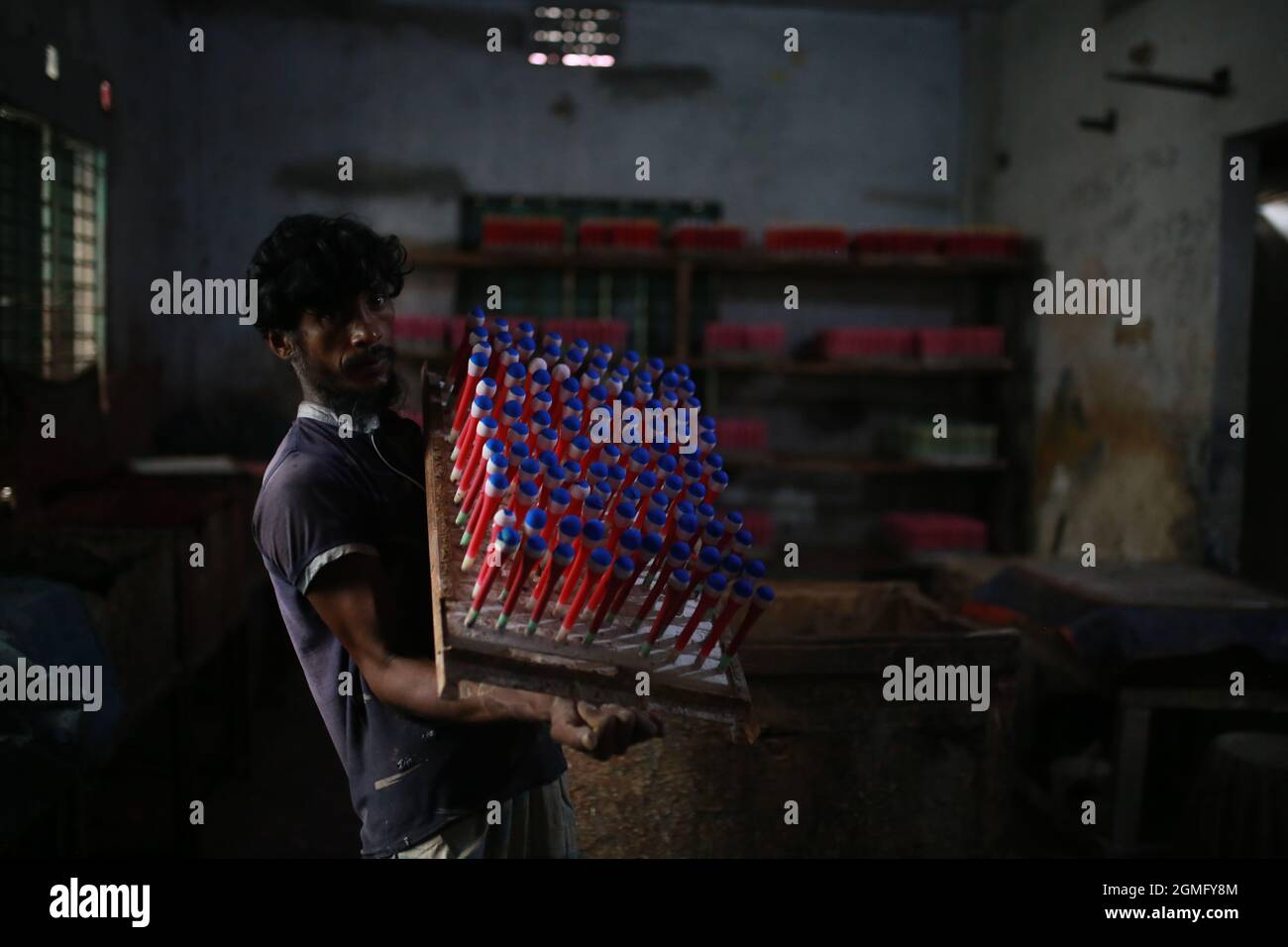 A man works in a balloon factory in Dhaka, Bangladesh. Balloon ...