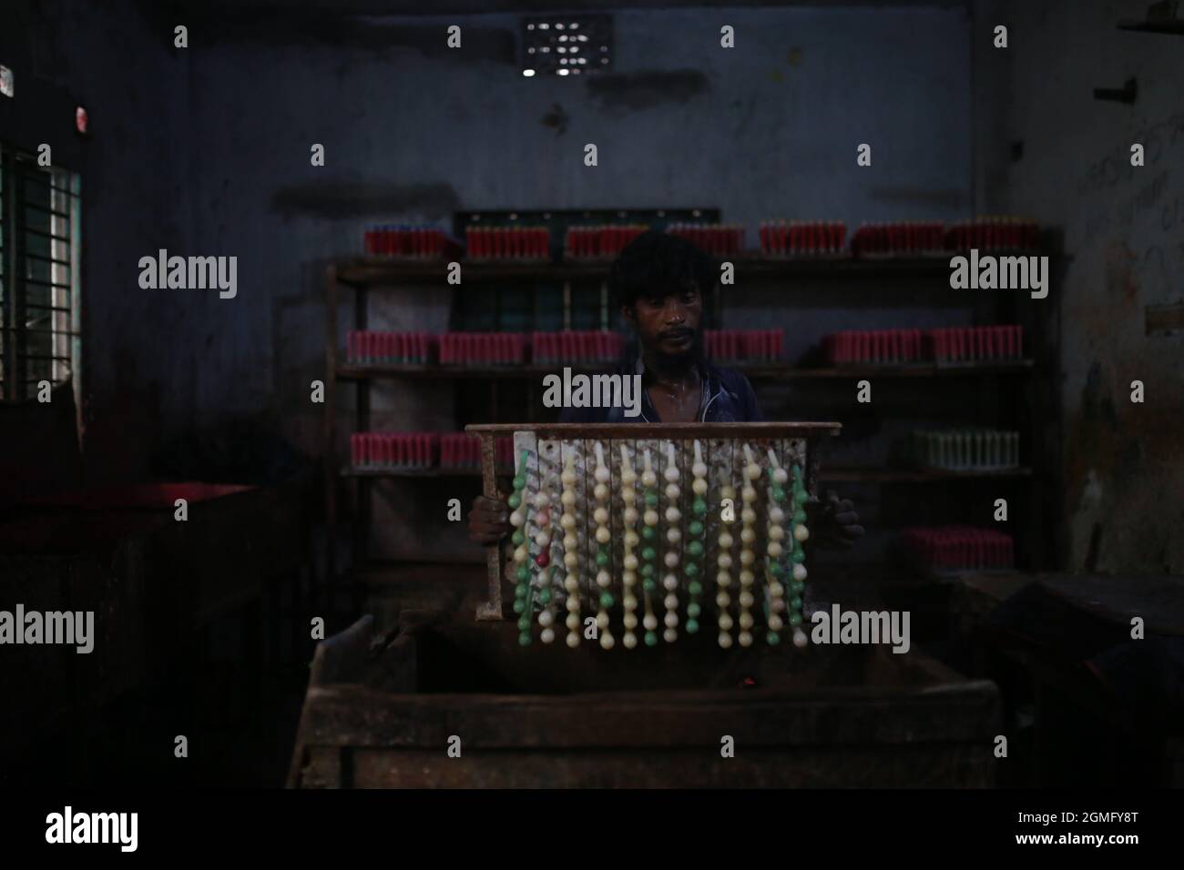 A man works in a balloon factory in Dhaka, Bangladesh. Balloon ...