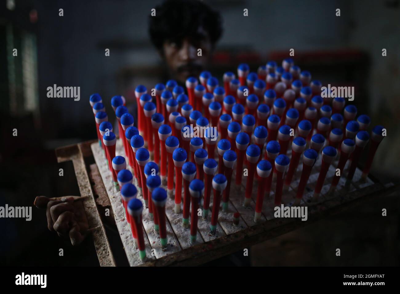 A man works in a balloon factory in Dhaka, Bangladesh. Balloon ...