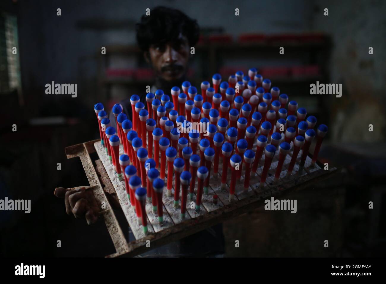 A man works in a balloon factory in Dhaka, Bangladesh. Balloon ...