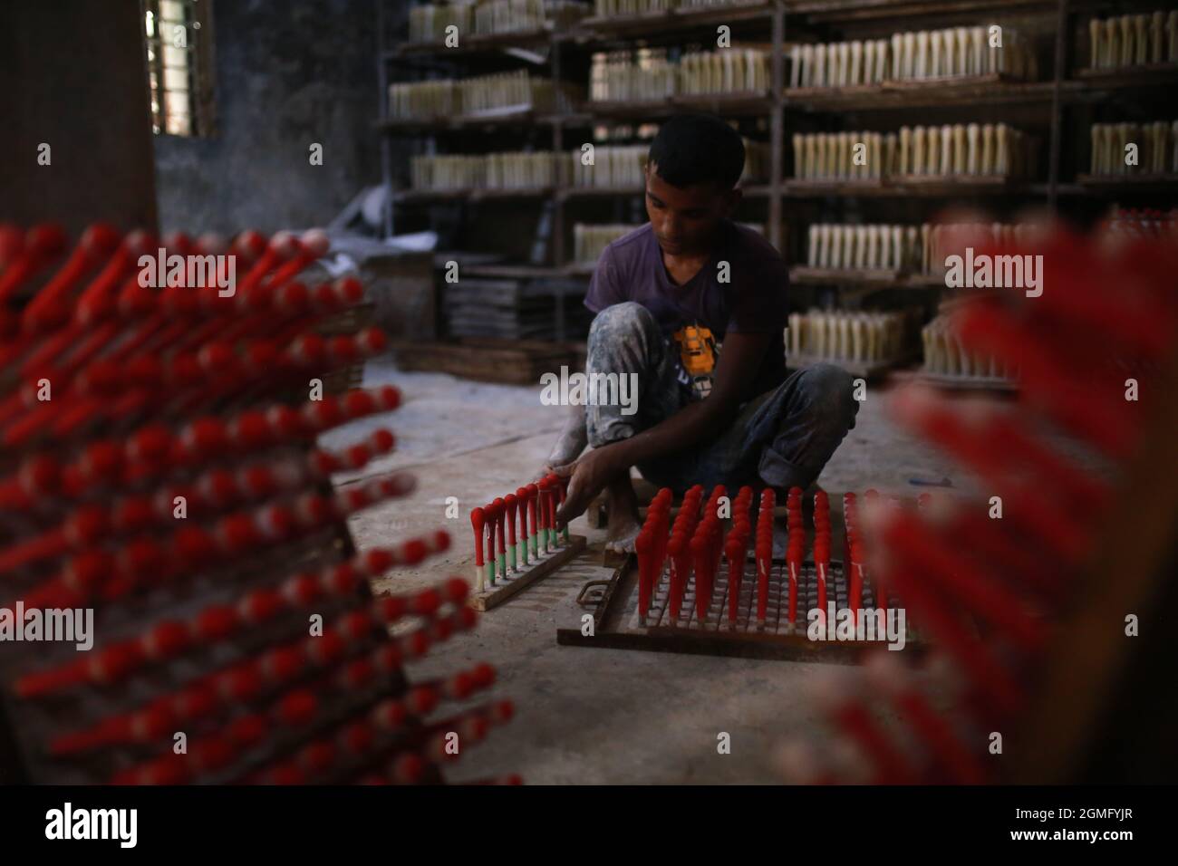 A man works in a balloon factory in Dhaka, Bangladesh. Balloon ...