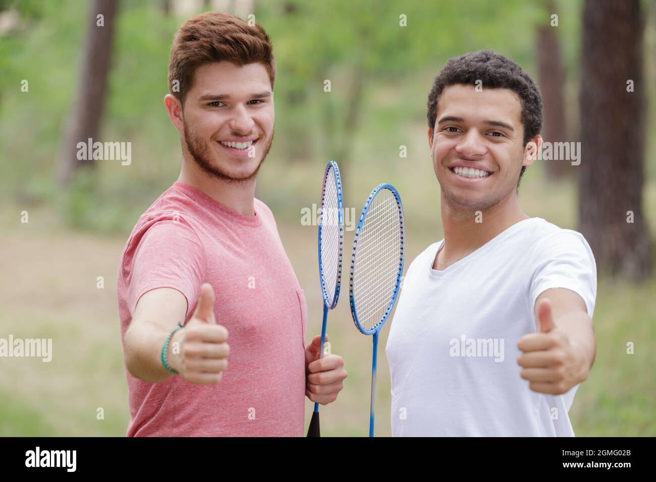2 men playing badminton outdoors Stock Photo - Alamy