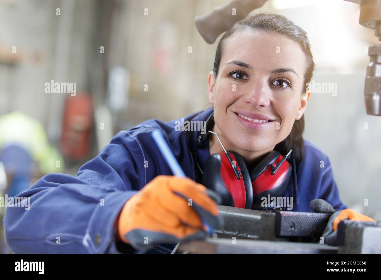 female carpenter at work smiling Stock Photo - Alamy