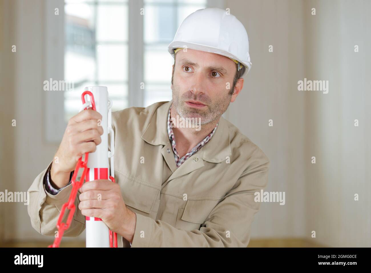 a male worker inside construction Stock Photo - Alamy