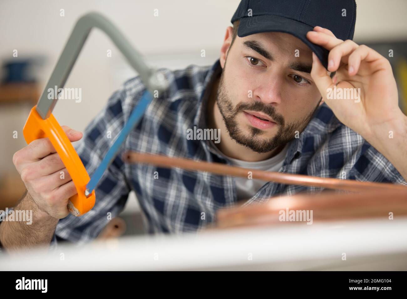 worker cutting the copper pipe of air conditioner Stock Photo - Alamy