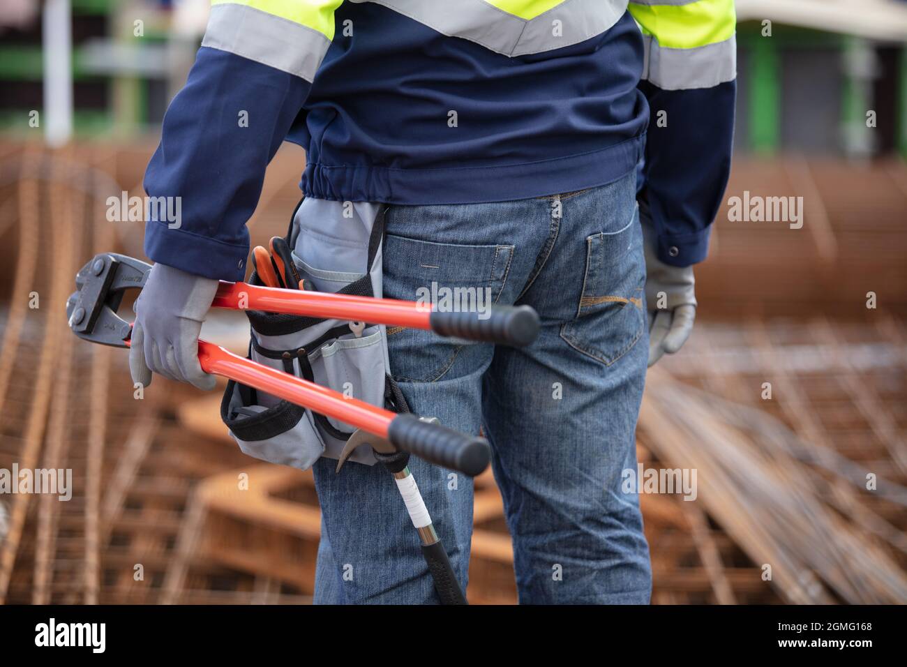 Construction holding rebar construction site hi-res stock photography ...