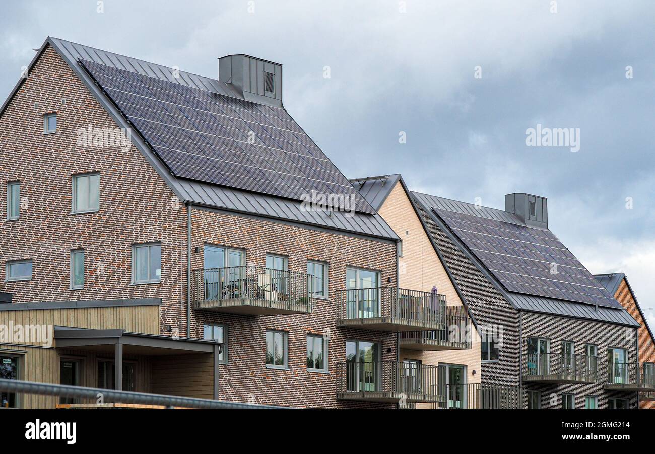 Modern house with solar panels on the gable roof Stock Photo - Alamy