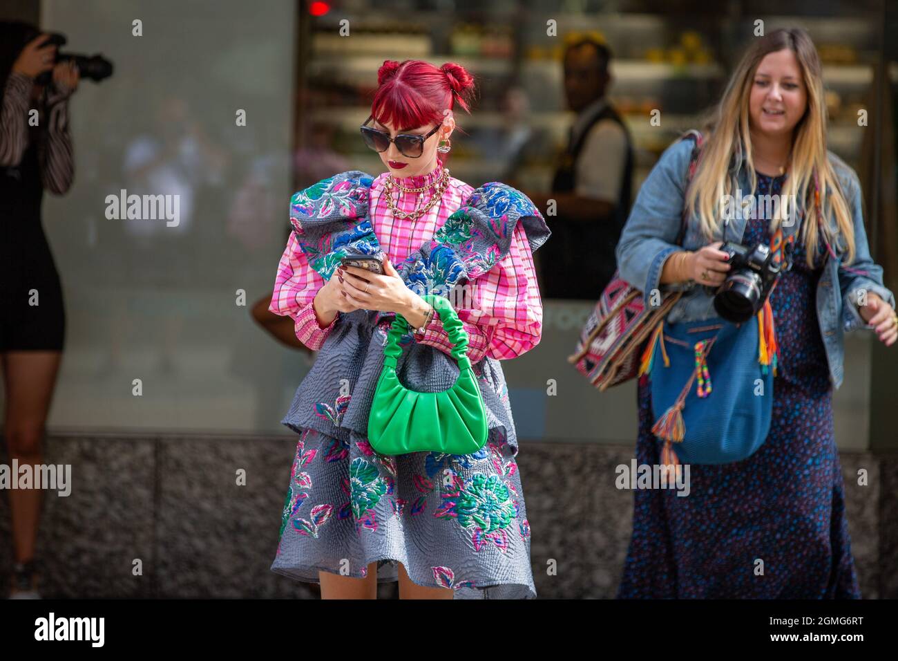 London, UK. 18th Sep, 2021. Fashionista in a colourful outfit is seen ...